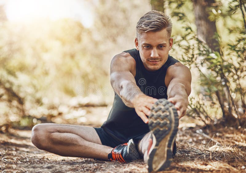 Stretching before You Run Will Help Your Muscles. a Young Man ...