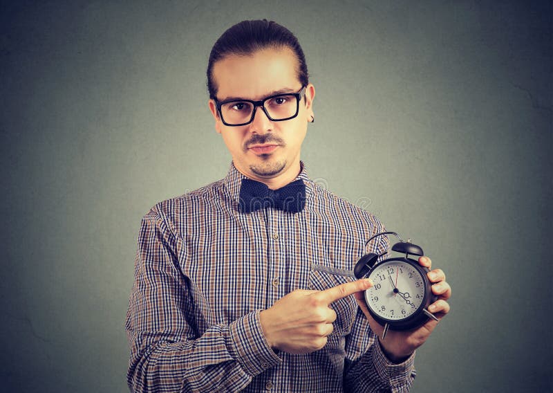 Strict Man Pointing at Clock Stock Photo - Image of employee, confident ...