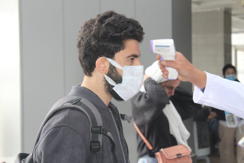 Strict Precautionary Measures before a Building Entry, Temperature ...