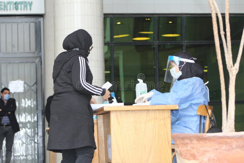 Strict Precautionary Measures before a Building Entry, Temperature ...