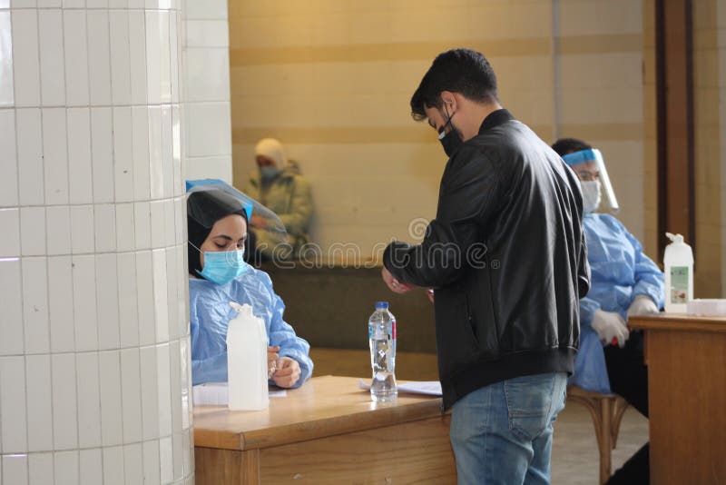 Strict Precautionary Measures before a Building Entry, Temperature ...