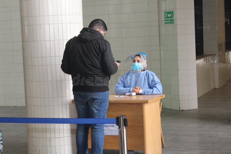 Strict Precautionary Measures before a Building Entry, Temperature ...