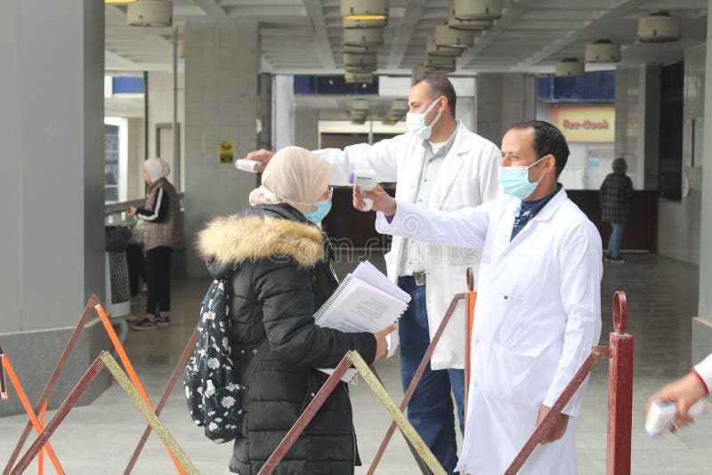 Strict Precautionary Measures before a Building Entry, Temperature ...