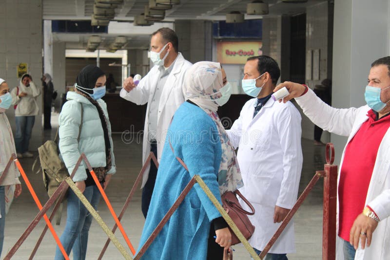 Strict Precautionary Measures before a Building Entry, Temperature ...