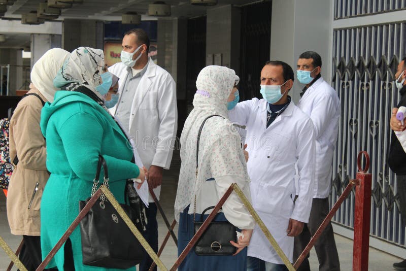 Strict Precautionary Measures before a Building Entry, Temperature ...