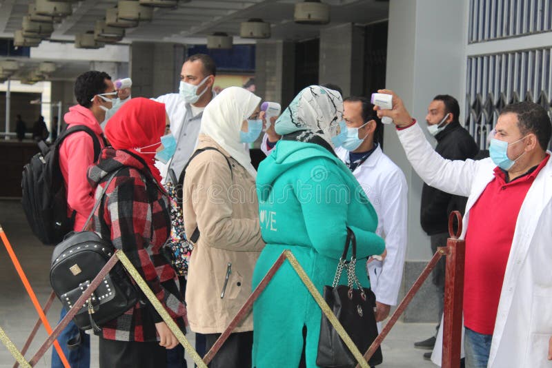 Strict Precautionary Measures before a Building Entry, Temperature ...