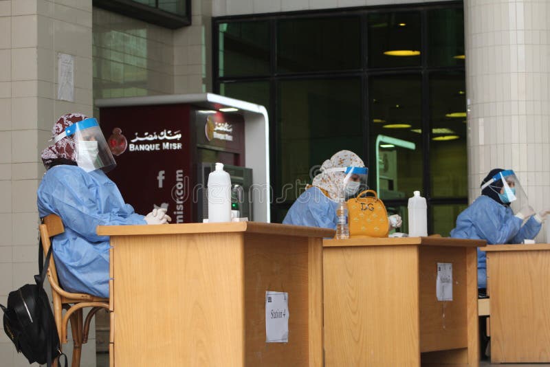 Strict Precautionary Measures before a Building Entry, Temperature ...