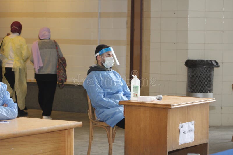 Strict Precautionary Measures before a Building Entry, Temperature ...