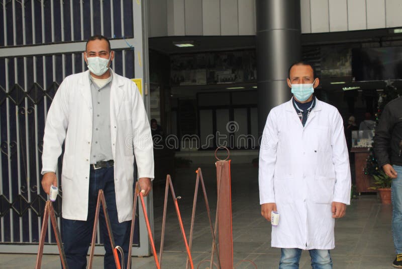 Strict Precautionary Measures before a Building Entry, Temperature ...