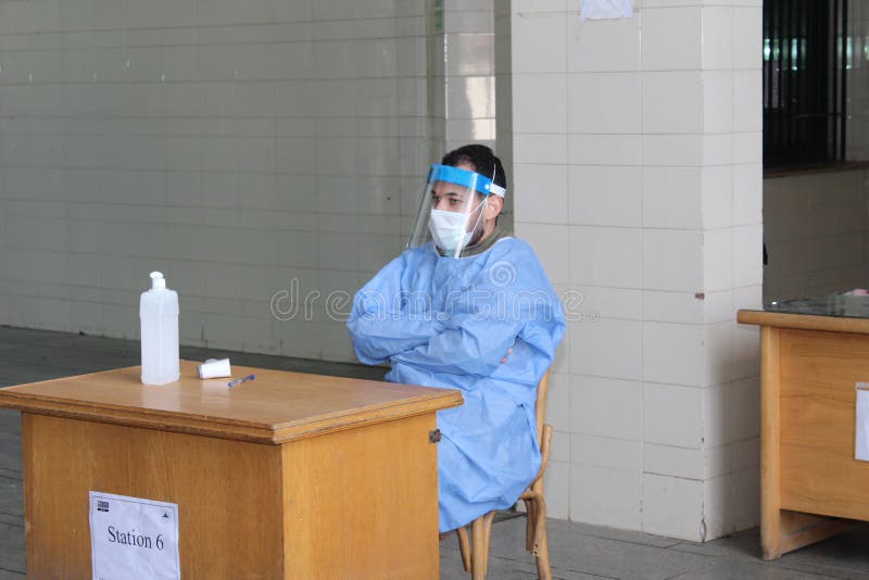 Strict Precautionary Measures before a Building Entry, Temperature ...