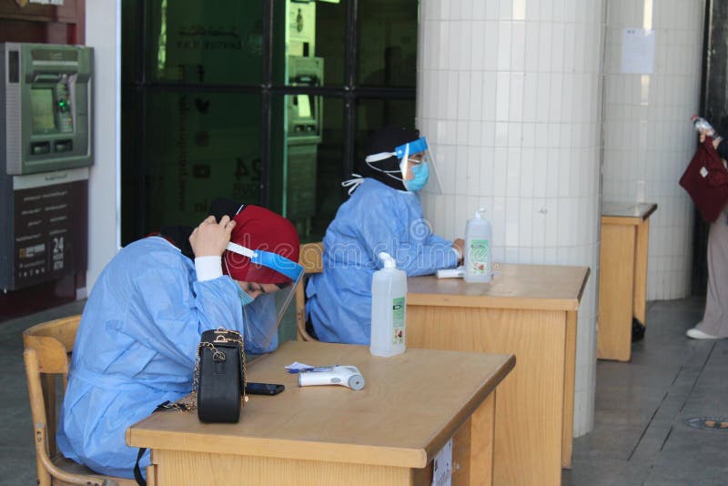 Strict Precautionary Measures before a Building Entry, Temperature ...