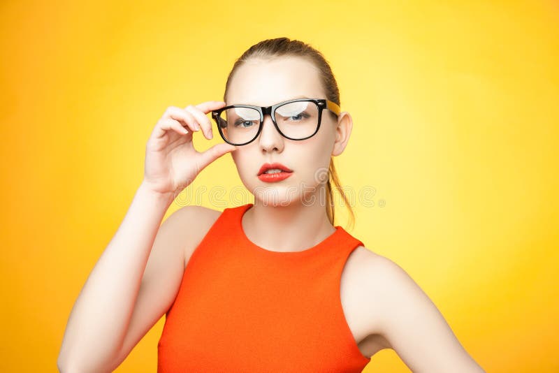Strict Woman Glasses Over Orange Background Stock Photos - Free ...