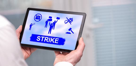 Strike concept on a tablet stock photo. Image of concept - 261070348
