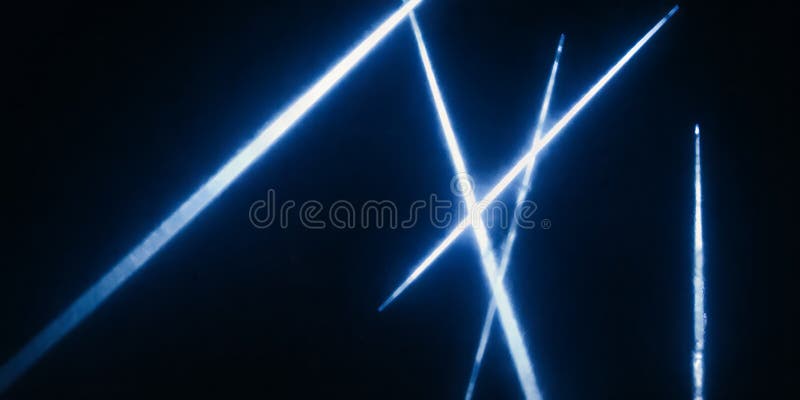 A Striking Display of Converging and Parallel Bright Blue Light Beams ...