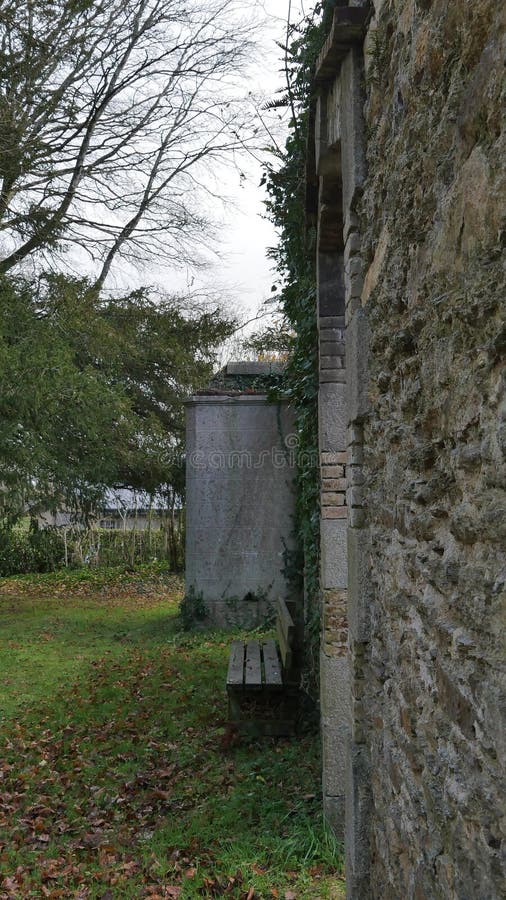 Facade of Historical Breton Rock Wall with Brick Details and Wooden ...