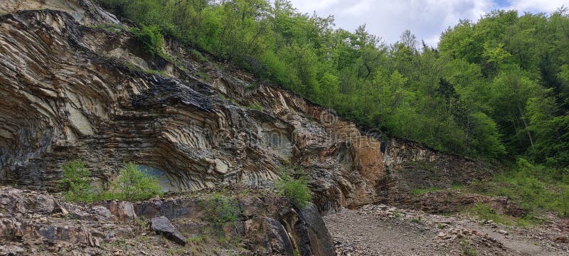 Exposed Folded Rock Layers in a Geological Notch Stock Photo - Image of ...