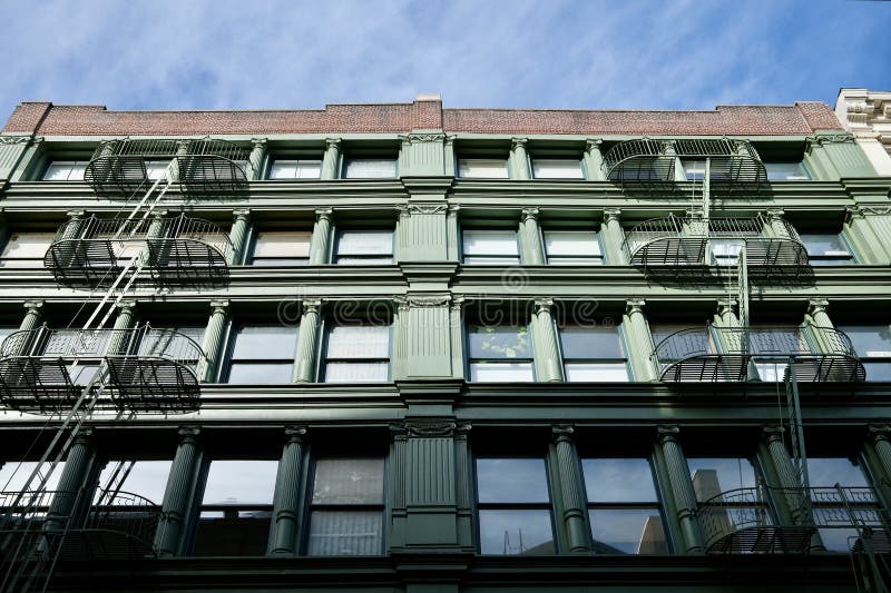 Green Cast-Iron Building with Fire Escapes (New York, New York, USA ...