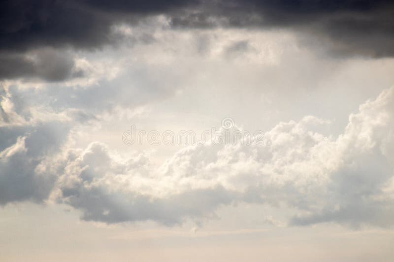 Dramatic Clouds with Light Breaking through, Offering Hope Amid Dark ...