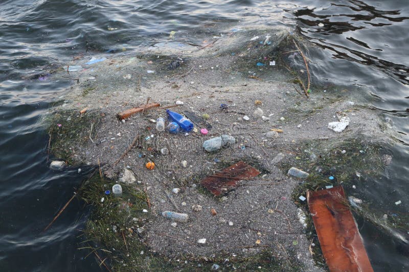 Plastic Trash and Debris Floating on Ocean Waves Stock Photo - Image of ...