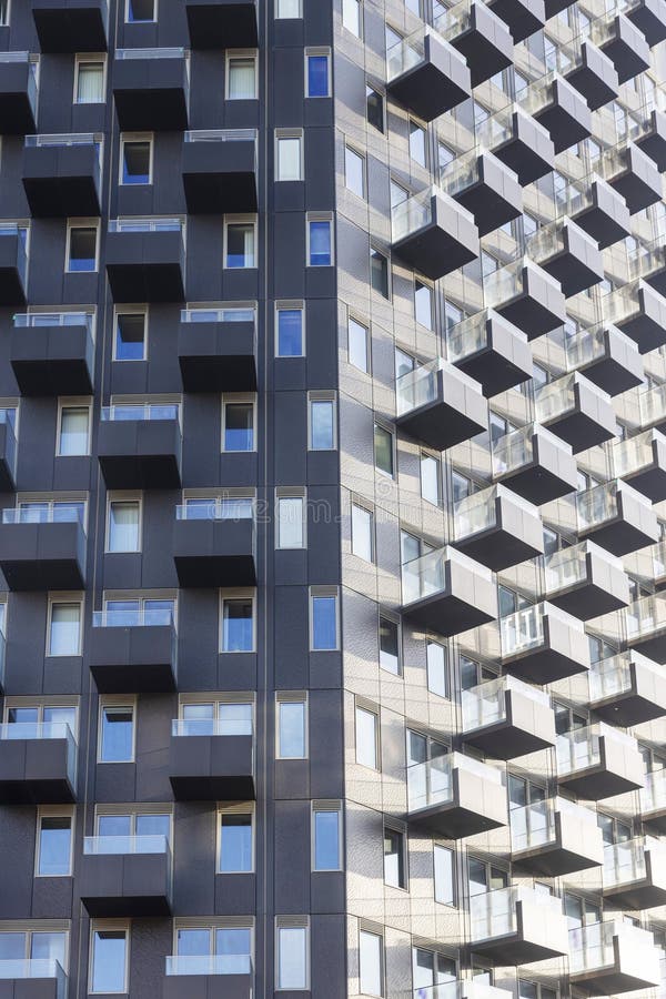 A Striking Modern Building Facade Features a Geometric Pattern Stock ...