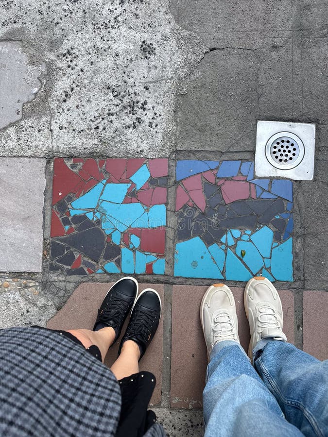 Striking Mosaic of Bold Red and Blue Patterns Stands Out on a Concrete ...