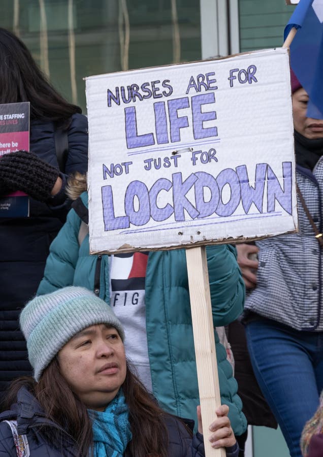 Striking Nurses Holding Signs at University College Hospital - London ... Striking Nurses Holding Signs at University College Hospital - London ...