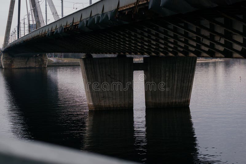 A Striking Perspective of a Cable-stayed Bridge Over a Calm River ...