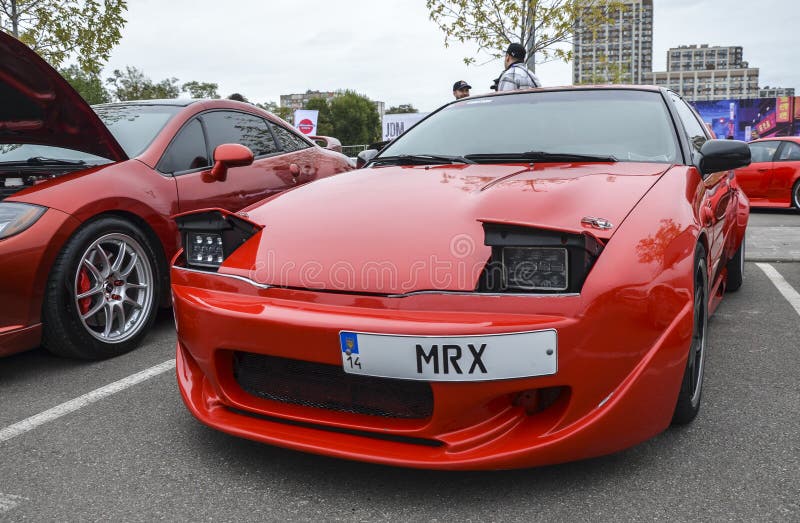 Striking Red Mitsubishi Eclipse, with Pop-up Headlights Editorial ...