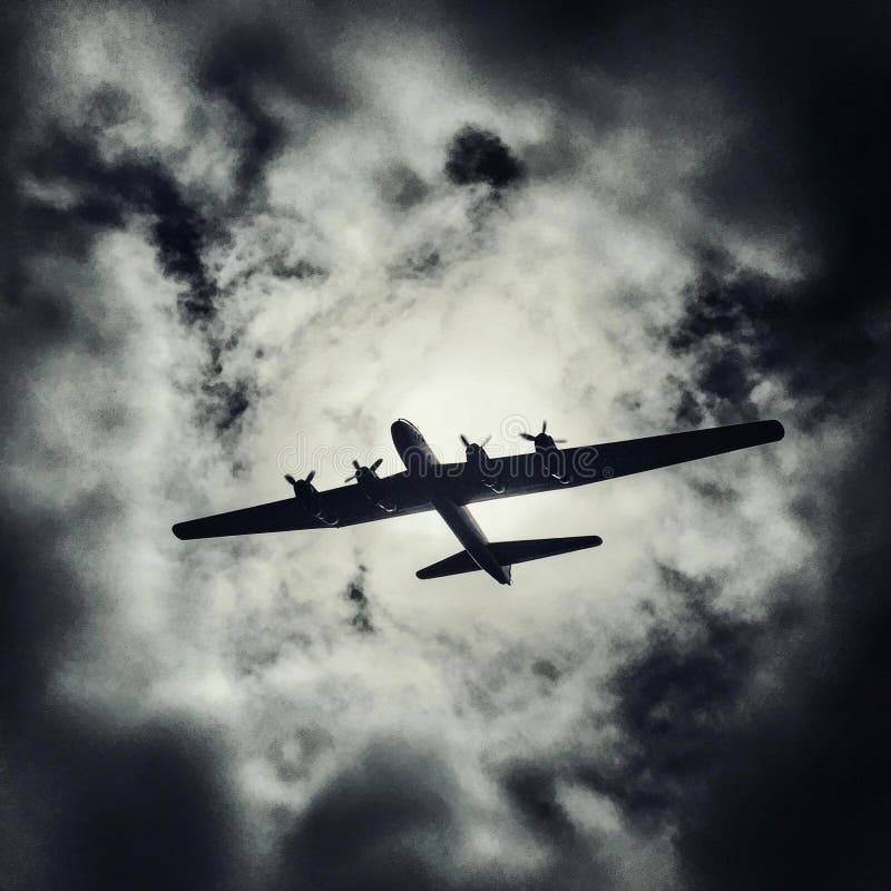 Dramatic Airplane Silhouette Against Stormy Sky Stock Image - Image of ...
