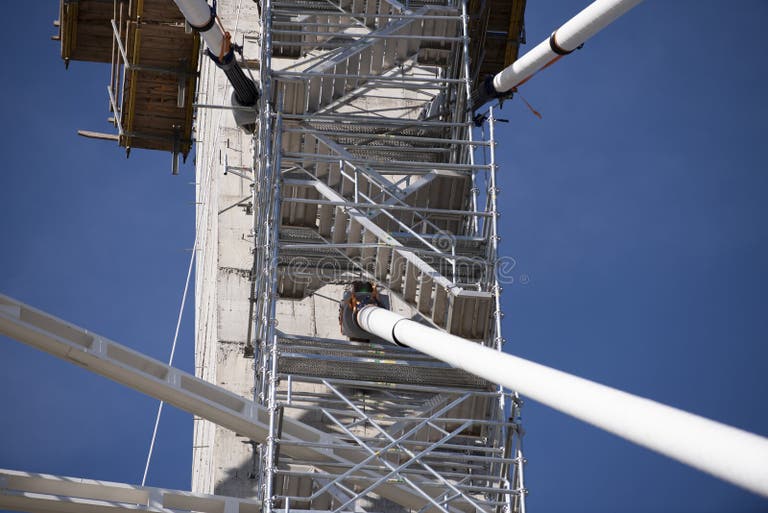 Upward View of Scaffolding and Tension Cables on Cable-Stayed Bridge ...