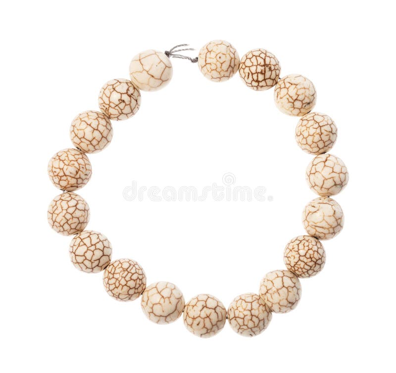 String of Beads Carved from Natural Bone on Gray Stock Image - Image of ...