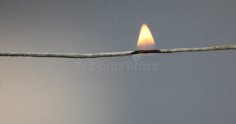 String burns with flame stock photo. Image of light - 213717692