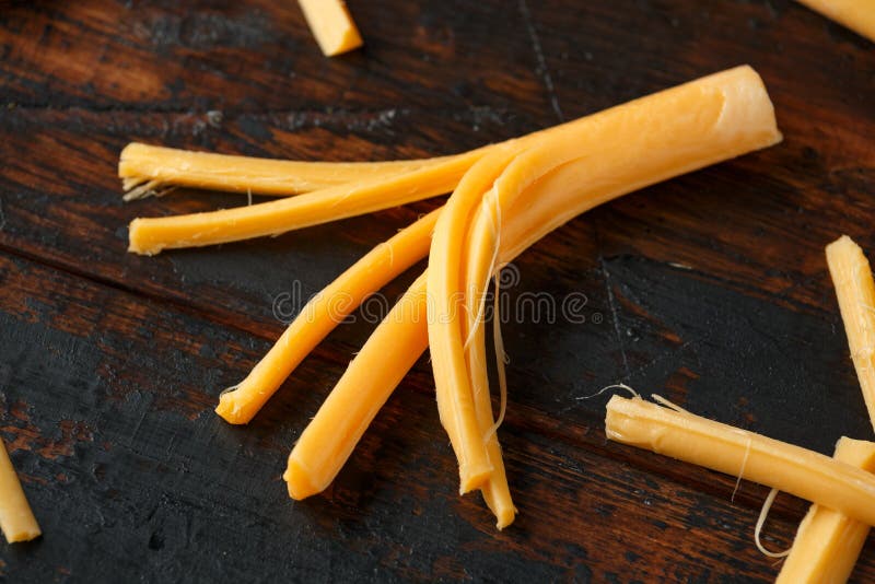 String Cheese on Rustic Wooden Table. Healthy Snack Stock Photo - Image ...