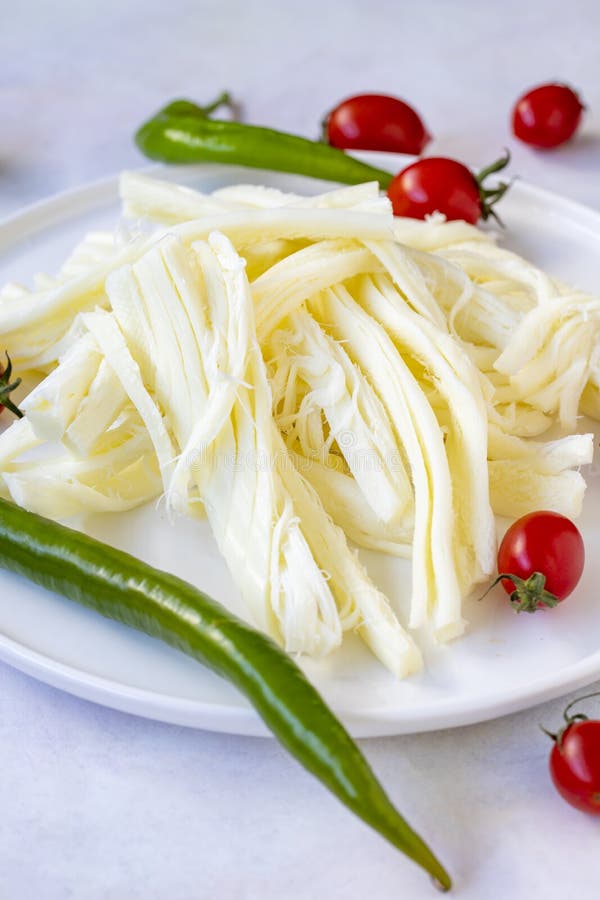 String Cheese on a White Plate. Close Up Stock Image - Image of ...