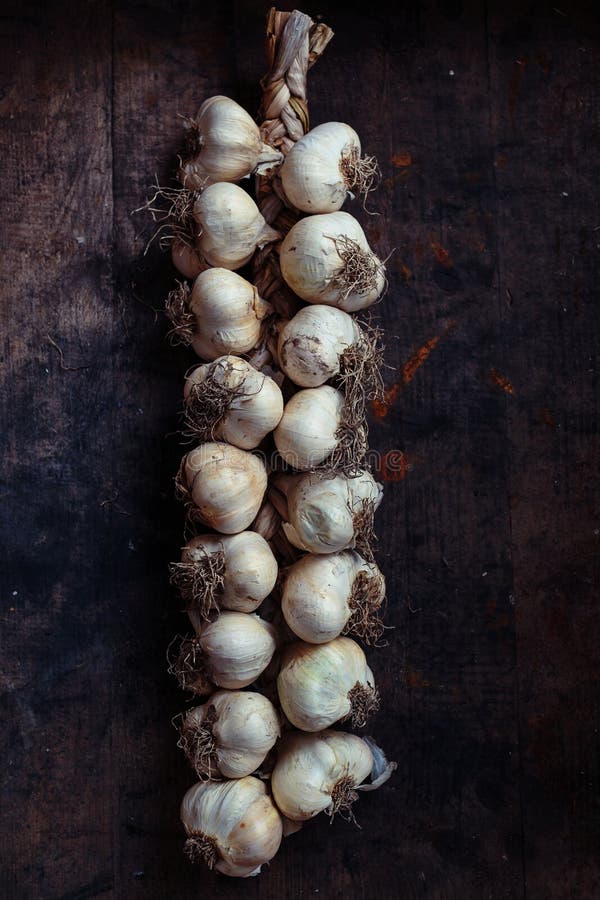 String of Garlic Hanging Outdoor. Healthy Food. Stock Photo - Image of ...