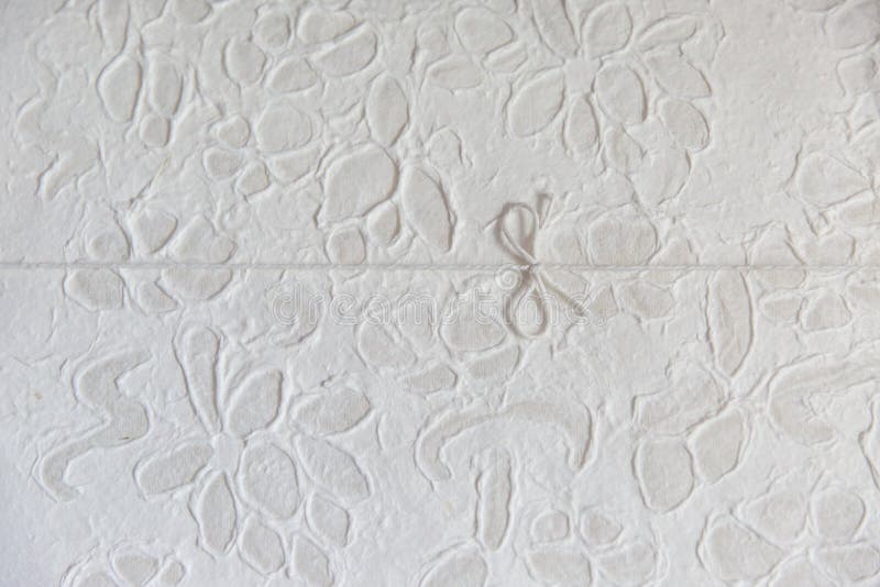String Knot Over Lace Paper Stock Image - Image of invitation, knot ...