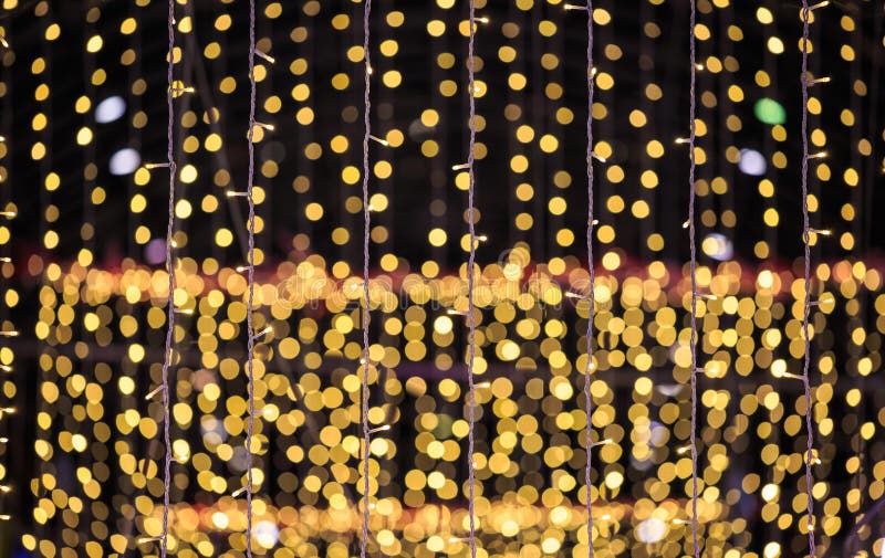 String of Light Bulbs on Yellow Abstract Background View Stock Image ...