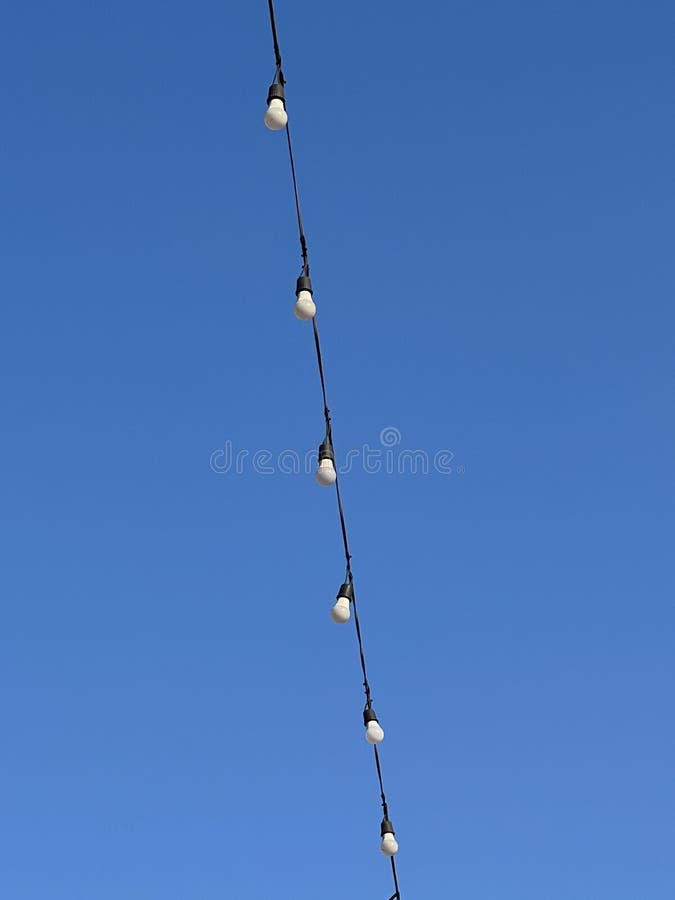 String Lights with Blue Sky As Background Stock Photo - Image of ...