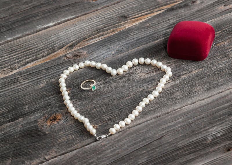 String of Pearls and Engagement Ring Stock Photo - Image of background ...