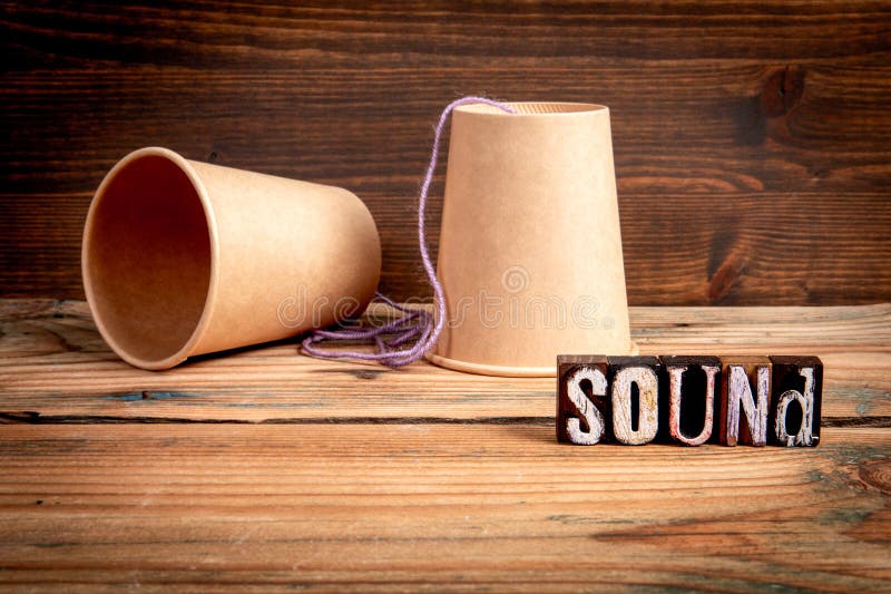 String Phone Made from Paper Cups with Word SOUND Representing Acoustic ...