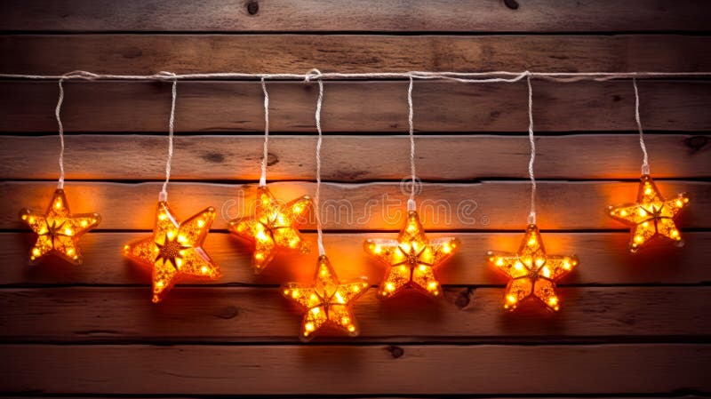 String of Star Shaped Lights Hanging from String on Wooden Wall ...