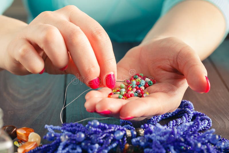 Stringing Beads on the Needle Stock Image - Image of woman, colorful ...