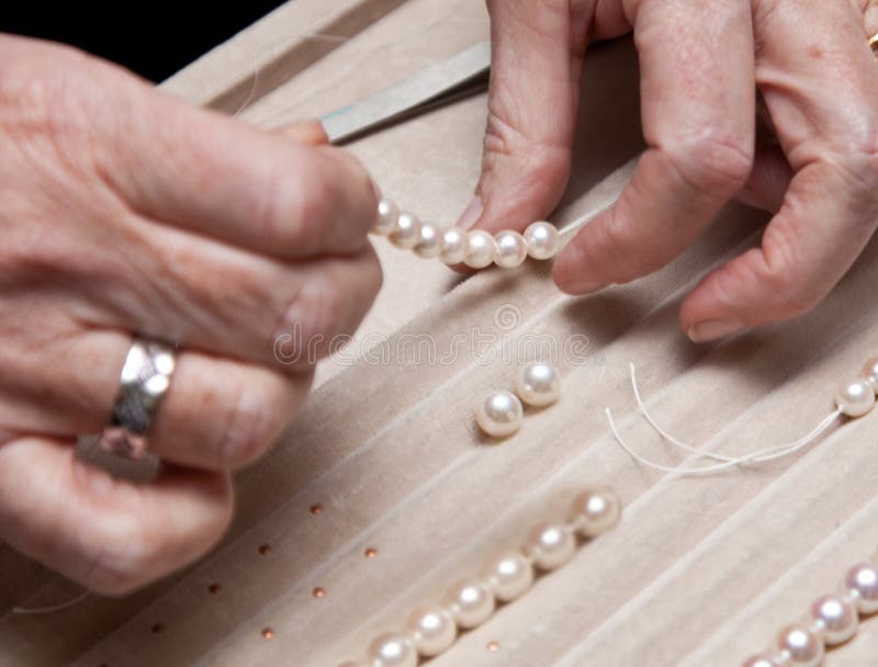 Stringing Pearls on a Necklace Stock Image - Image of necklace, hold ...