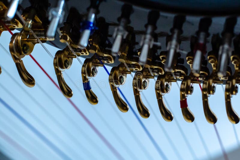 The Strings of the Harp Close-up on a Blue Background Stock Image ...