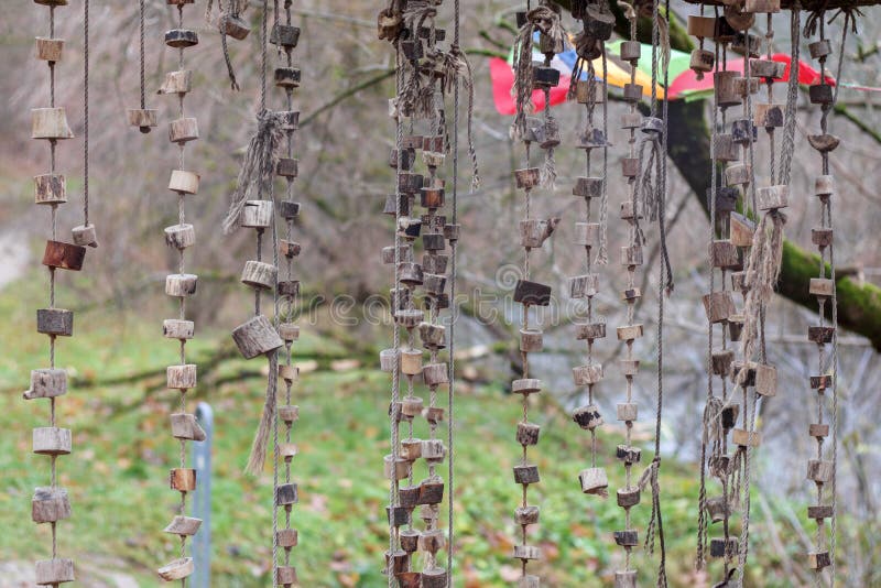 .Strings Made of Pieces of Wood, Hung from Tree Branches, Creating an ...