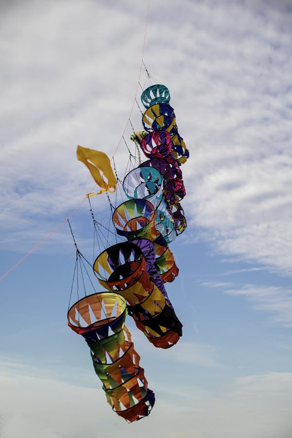 Strip with Multi Colored Circle Kites Flying, Blue Sky in the ...