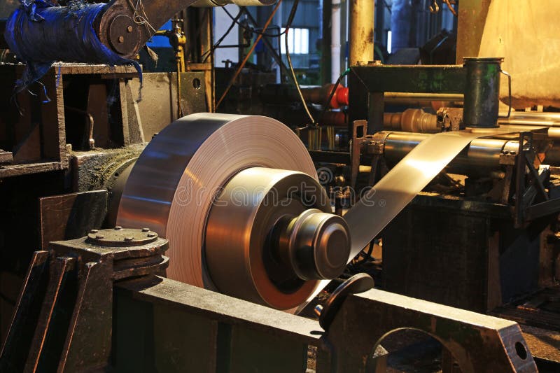 Strip steel in rotation stock photo. Image of industrial - 382788822