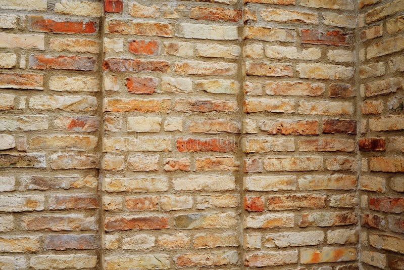 Striped bricks wall stock image. Image of bricks, corner - 68440583