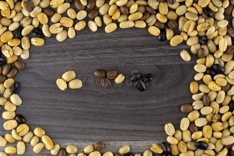 Striped Coffee Beans Isolated in a Wooden Background Stock Photo ...