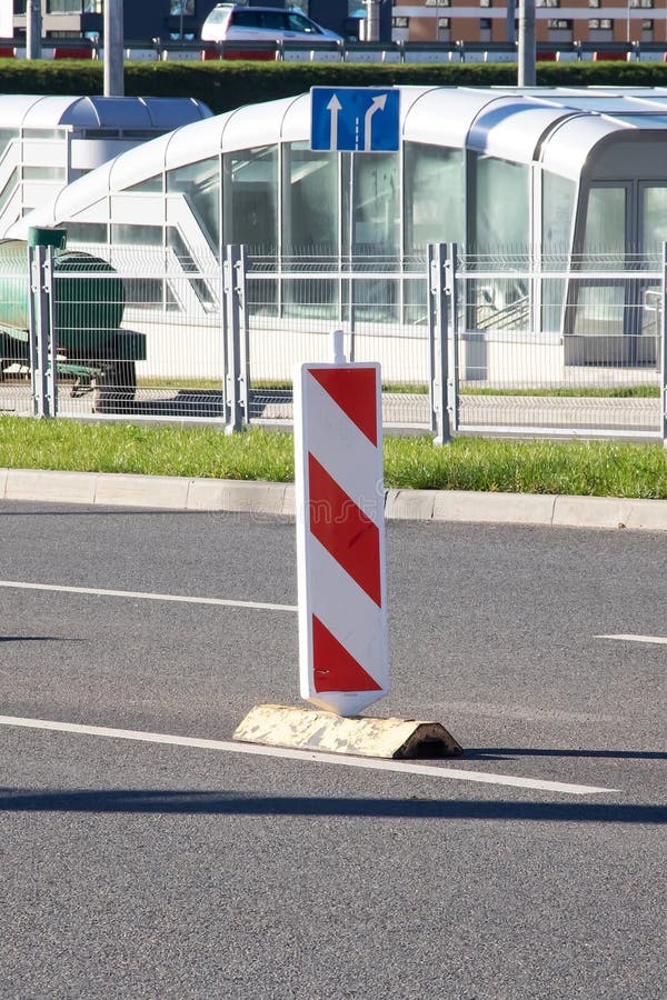 Striped Road Signs in Middle of Road Stock Image - Image of barrier ...